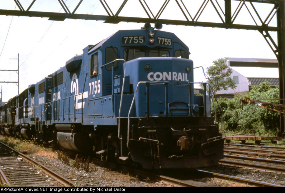 CR GP-38 #7755 leads a train past Nice Tower (CP Nice)